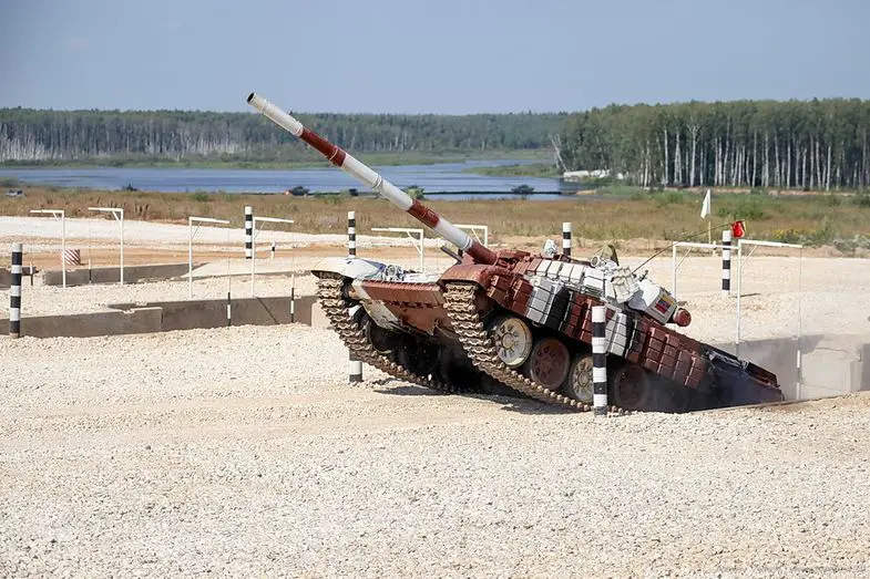 The Russian Tank Biathlon 2014 competition with tankers from 12 ...