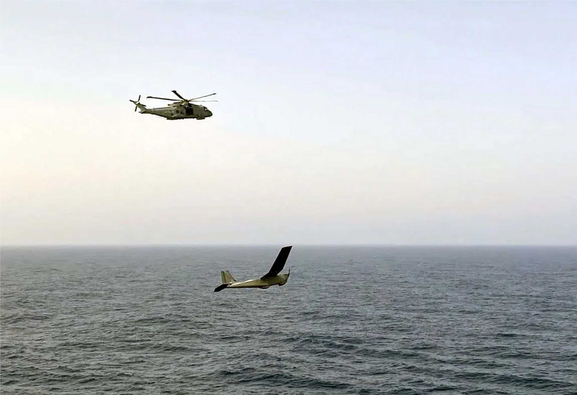 Breaking News: British Navy uses Puma drone to guide Merlin helicopter ...